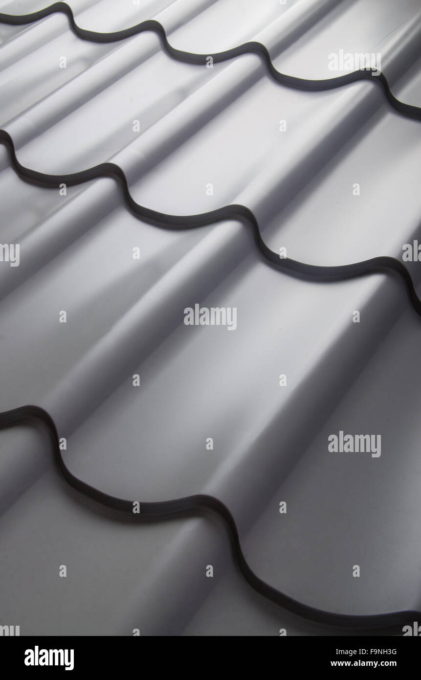 Close up of metal roof tile Stock Photo - Alamy