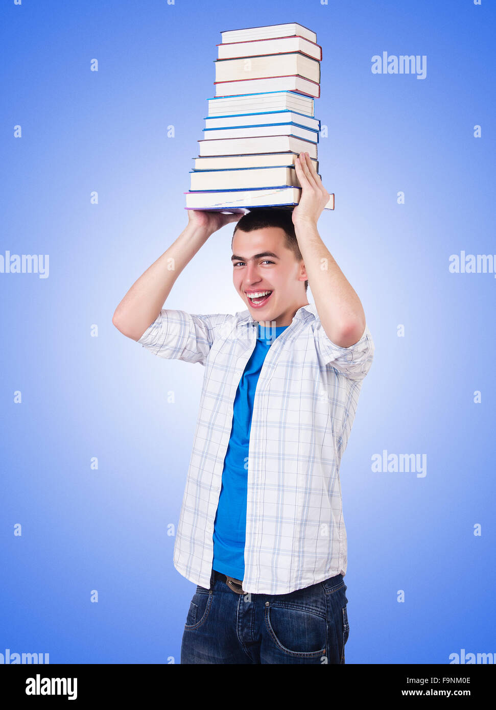 Student with lots of books on white Stock Photo - Alamy