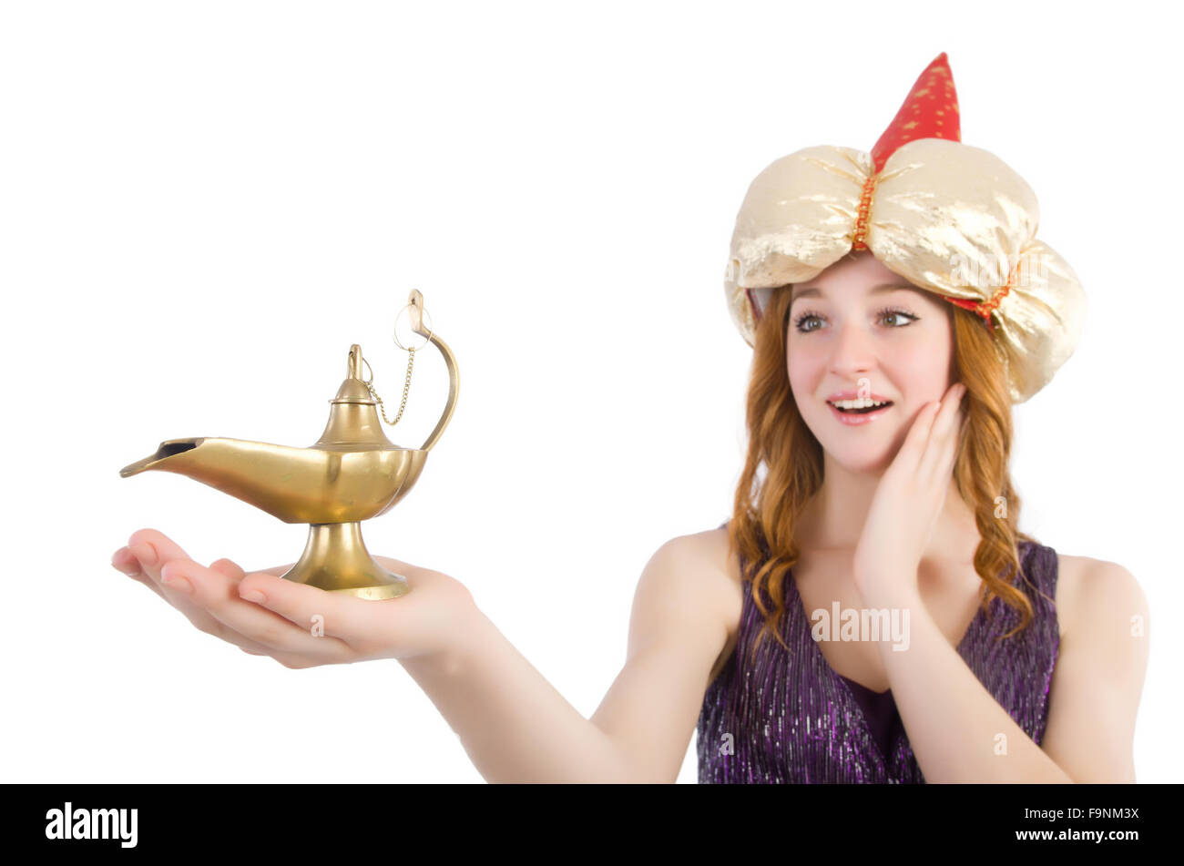 Pretty girl holding magic lamp isolated on white Stock Photo - Alamy