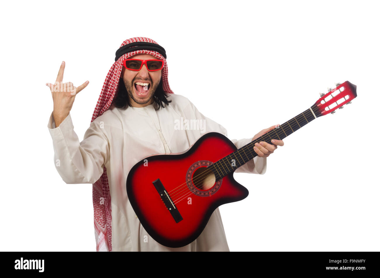 Arab man playing isolated on white Stock Photo - Alamy
