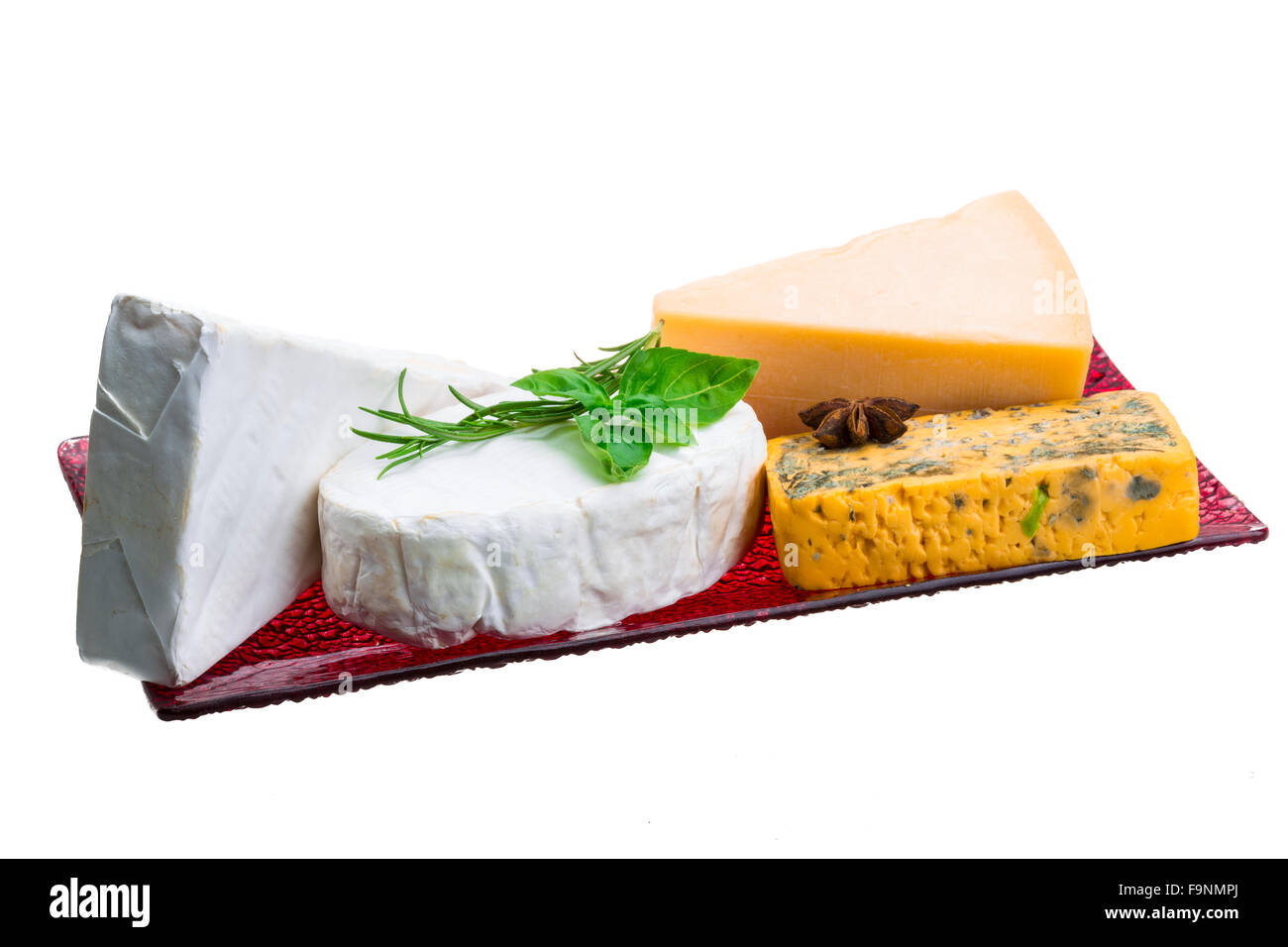Variety cheese assortment with nuts and herbs Stock Photo - Alamy