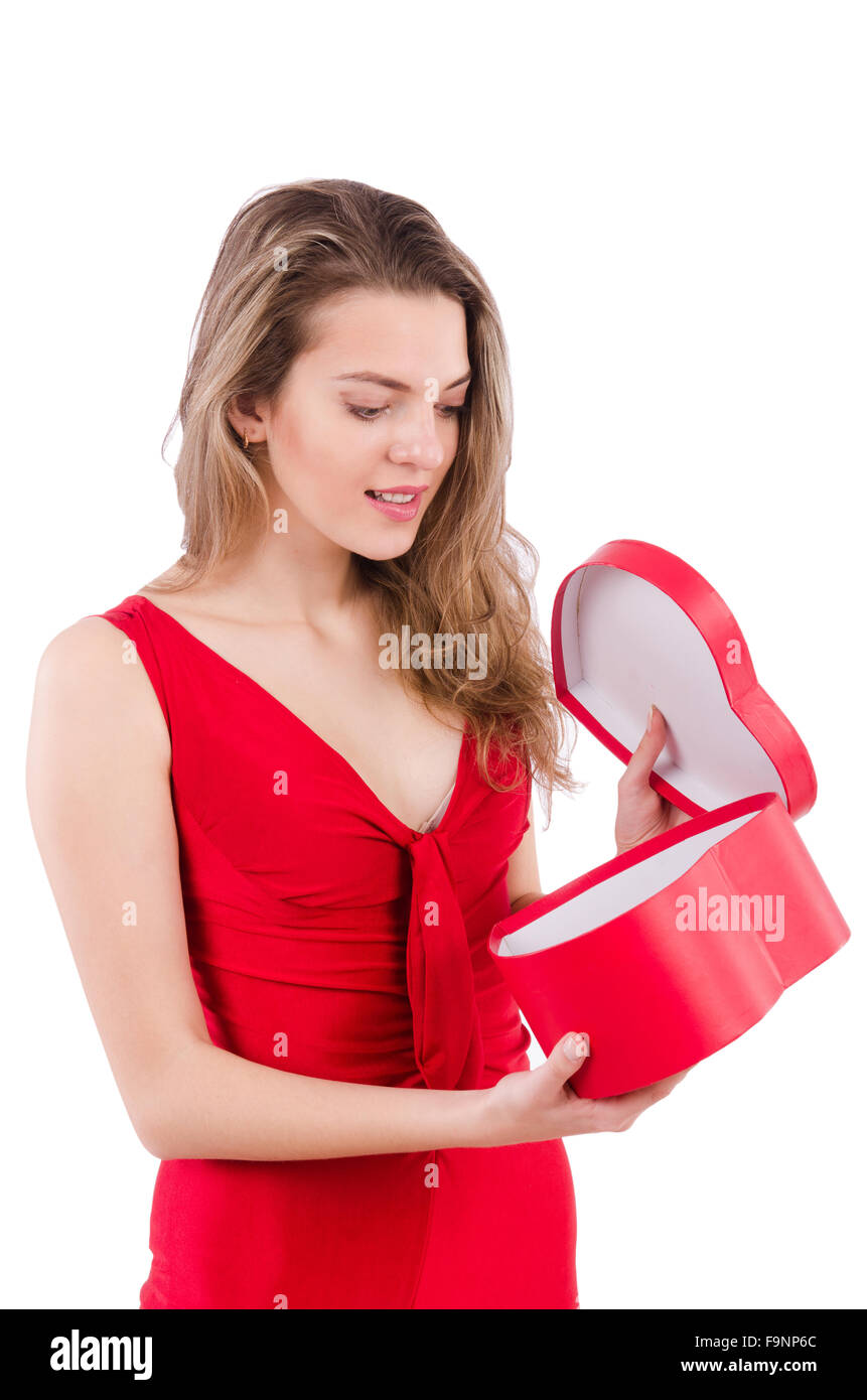 Pretty girl holding gift box isolated on white Stock Photo - Alamy