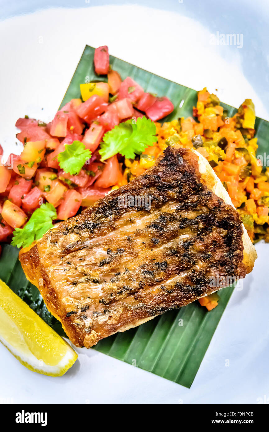 Pan fried white snapper Stock Photo - Alamy