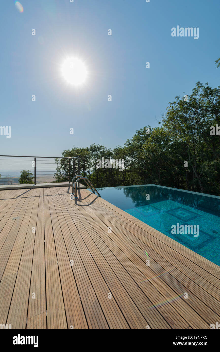Infinity pool on the bright summer day Stock Photo - Alamy