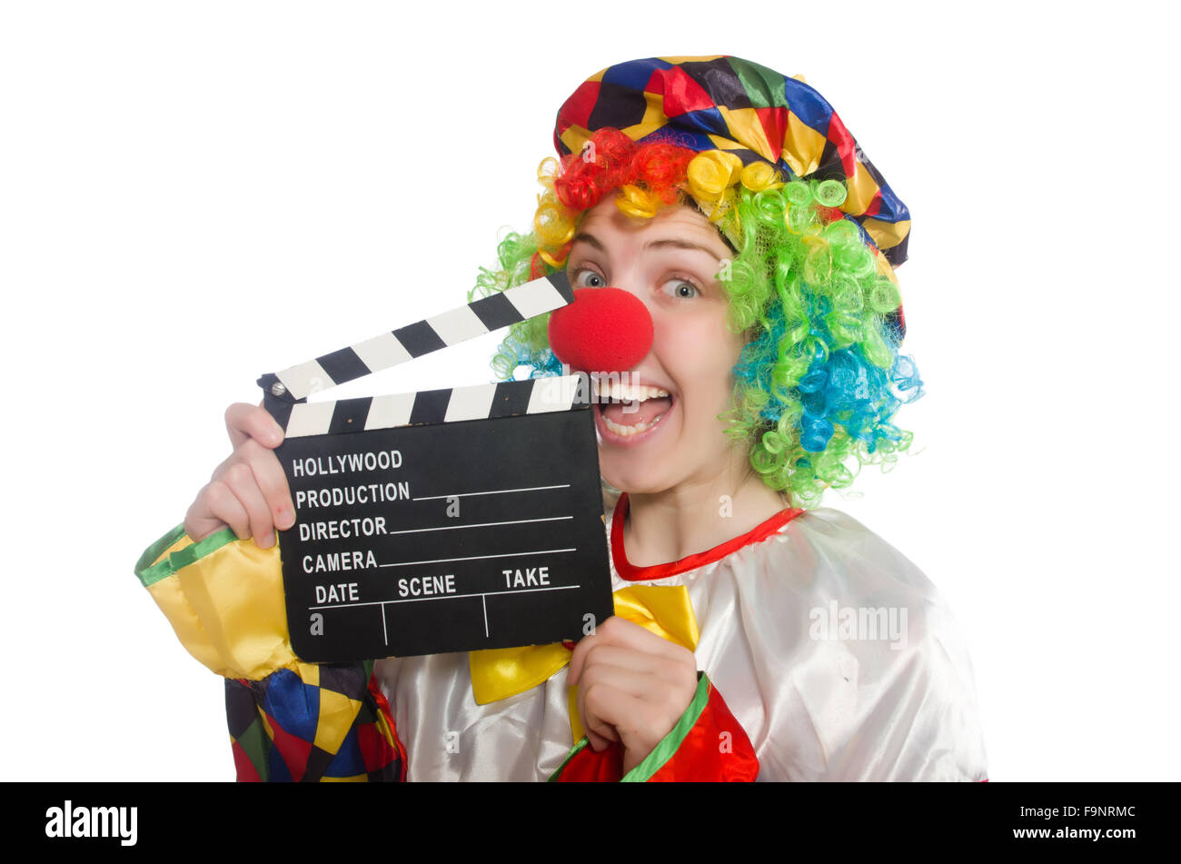 Clown with movie clapper isolated on white Stock Photo - Alamy