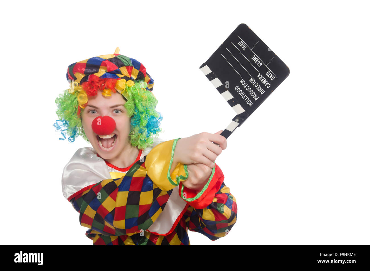 Clown with movie clapper isolated on white Stock Photo - Alamy