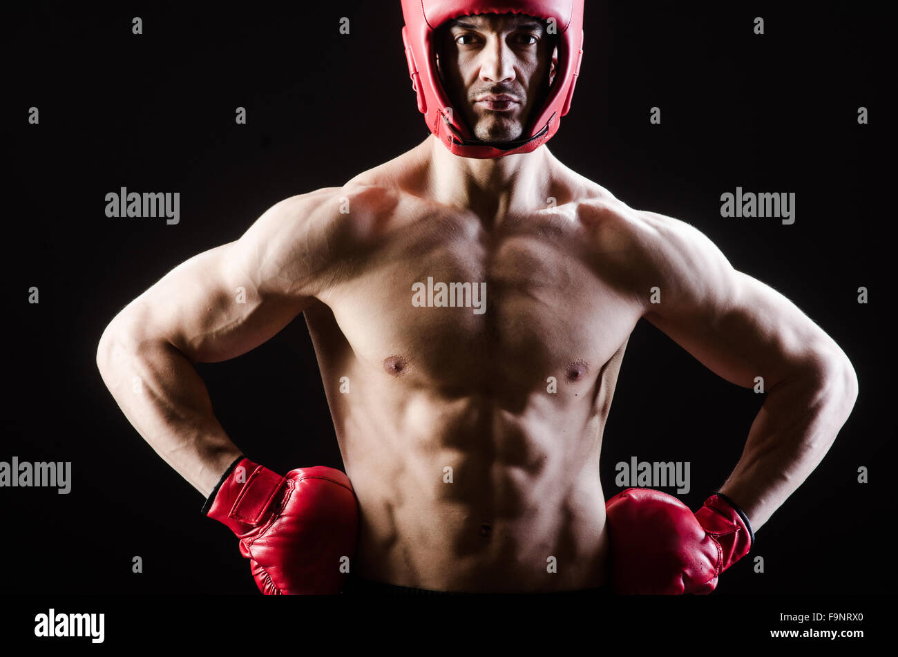 Muscular man in boxing concept Stock Photo - Alamy