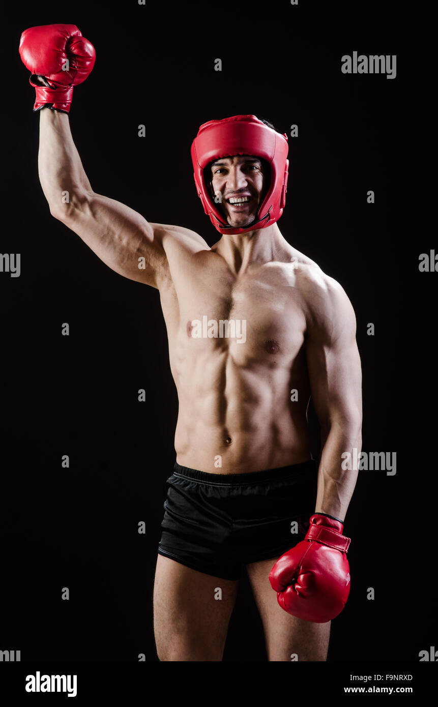 Muscular man in boxing concept Stock Photo - Alamy
