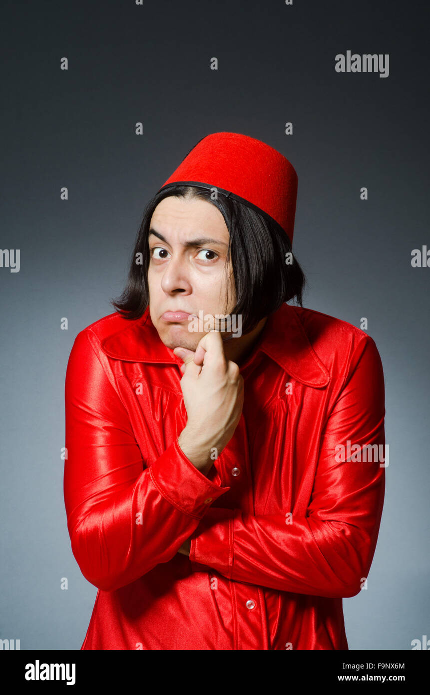 Man wearing red fez hat Stock Photo - Alamy