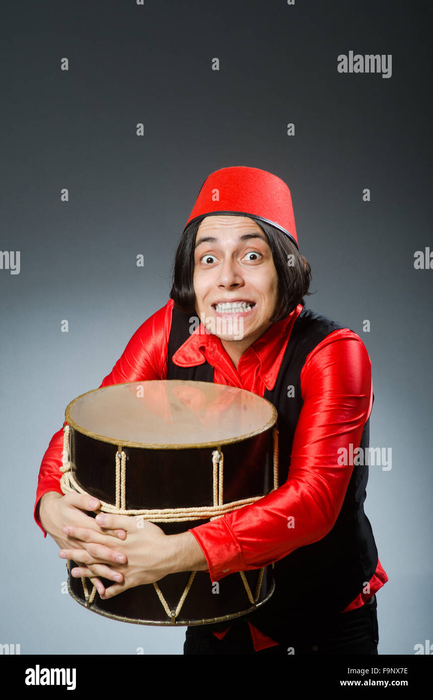 Man wearing red fez hat Stock Photo - Alamy