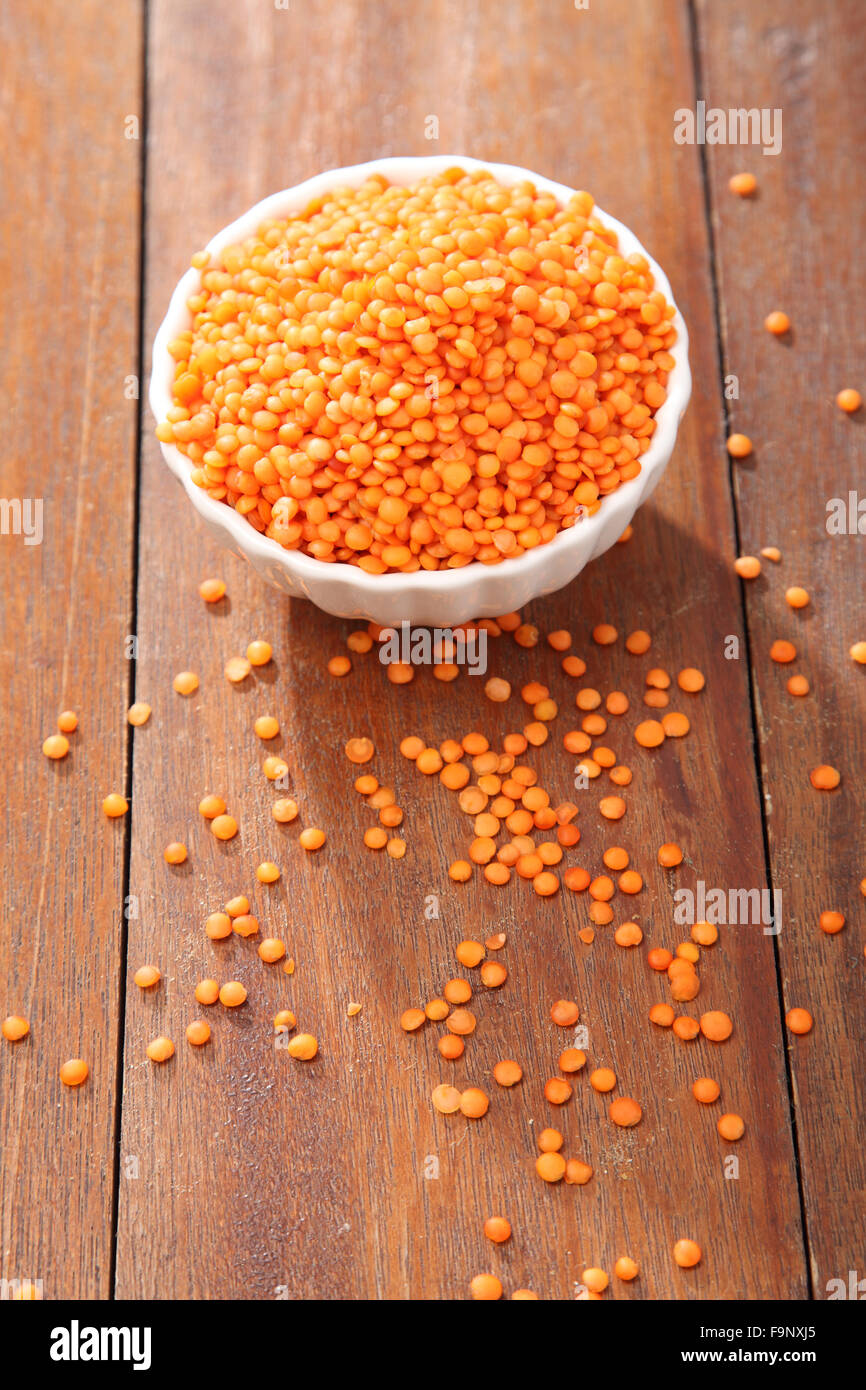 red rentils in a white bowl Stock Photo - Alamy