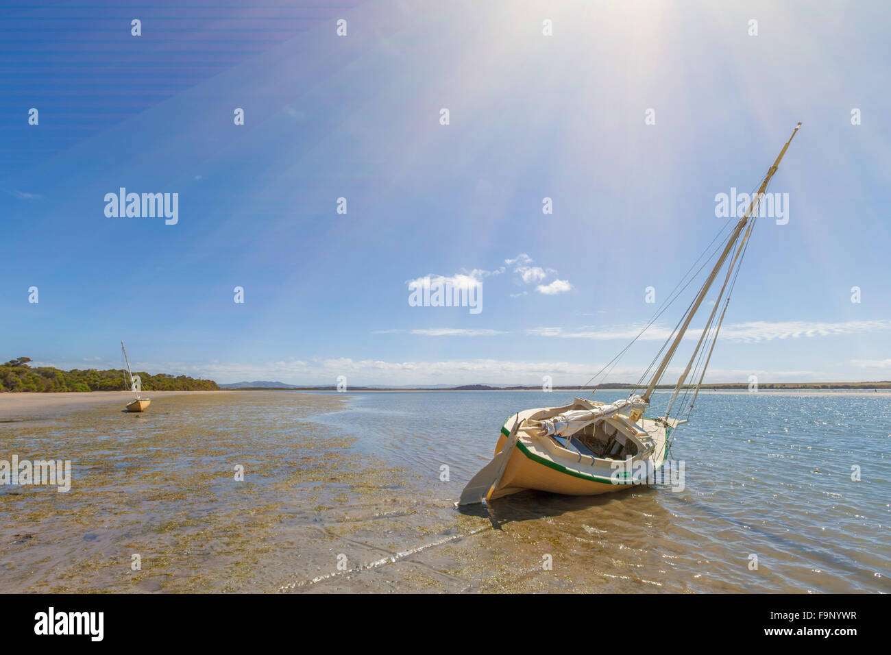 Two boats moored on the sand at Sandy Point beach, Victoria, Australia ...