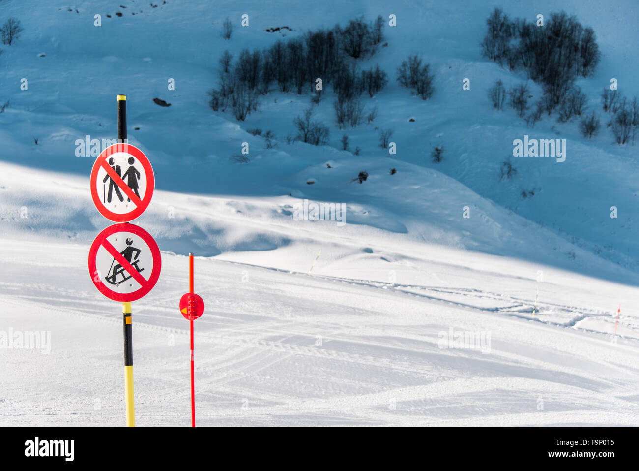 Danger sings on winter skiing resort Stock Photo - Alamy