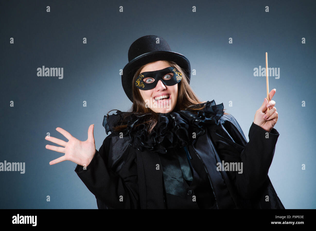 Woman magician in funny concept Stock Photo - Alamy
