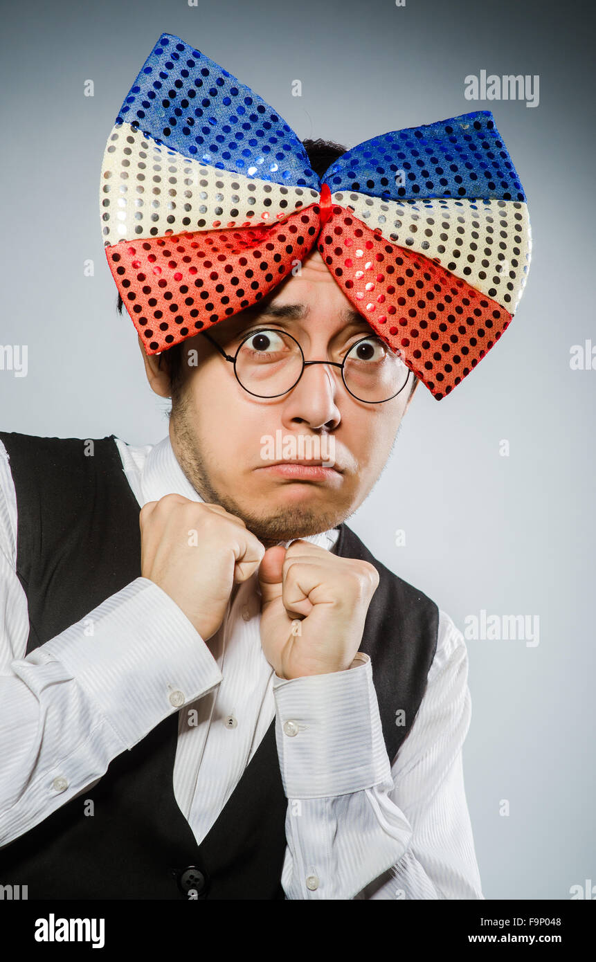 Funny man with giant bow tie Stock Photo - Alamy