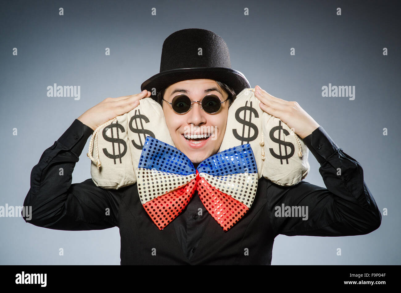 Funny man with money dollar sacks Stock Photo - Alamy