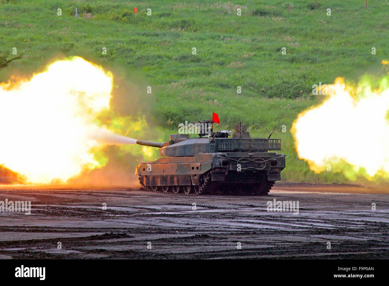 The type 10 Tank of JGSDF is firing 120 mm cannon Stock Photo - Alamy