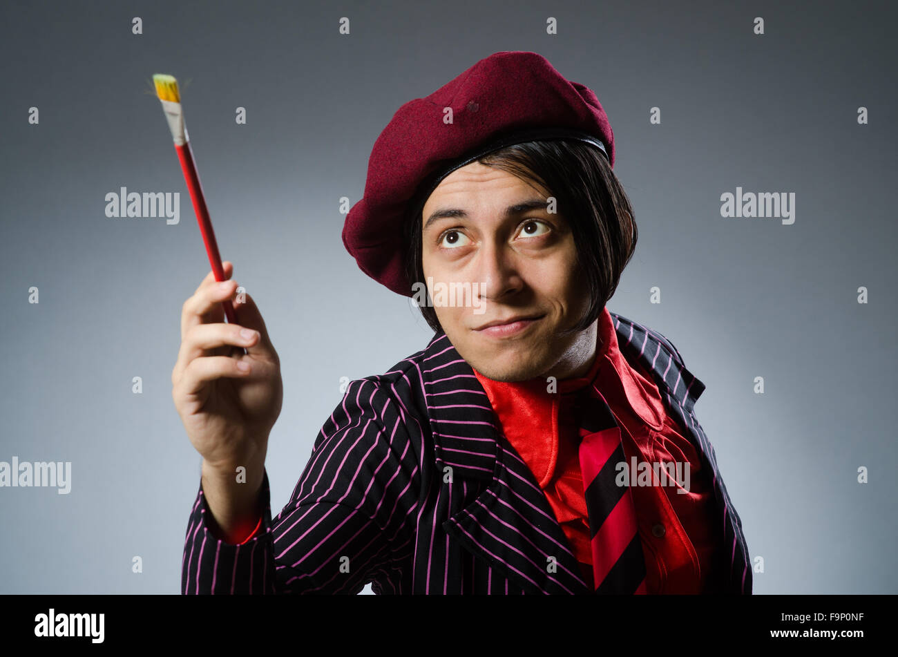 Funny artist with his artwork Stock Photo - Alamy