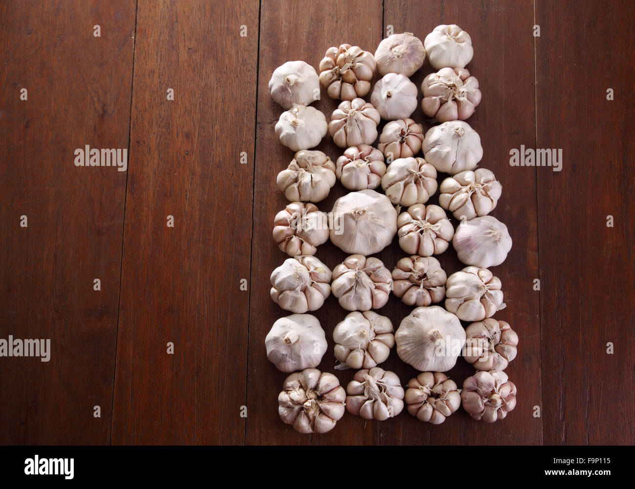 different size and shape of garlic well arranged Stock Photo - Alamy