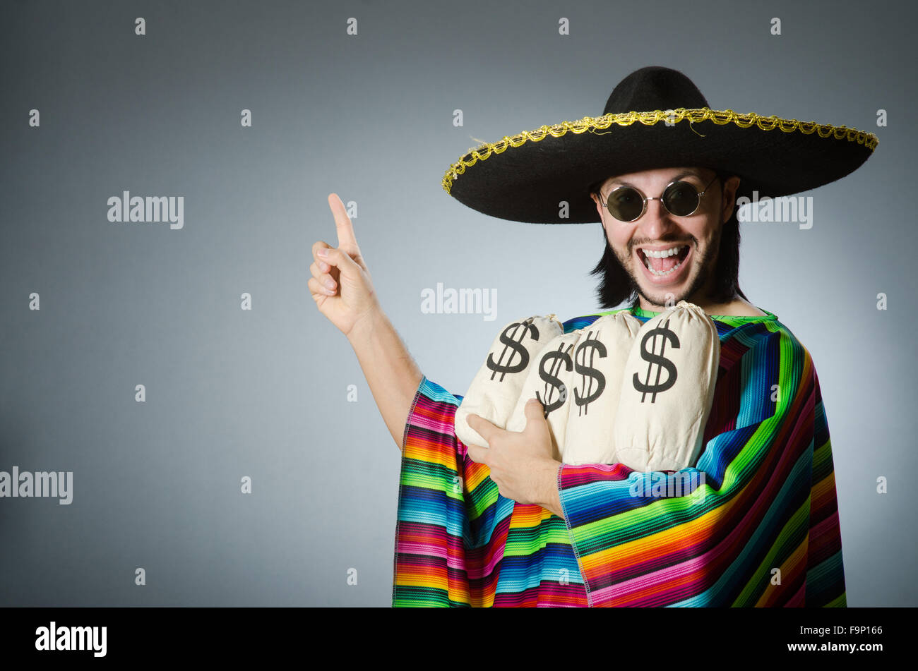 Mexican man with money sacks Stock Photo - Alamy