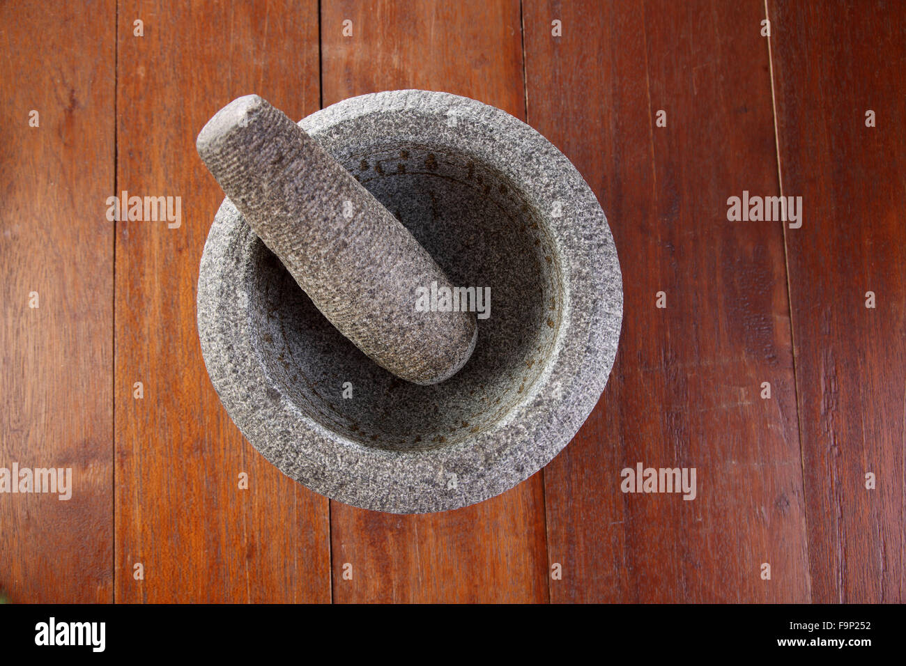 top view of stone mortar and pestle Stock Photo - Alamy