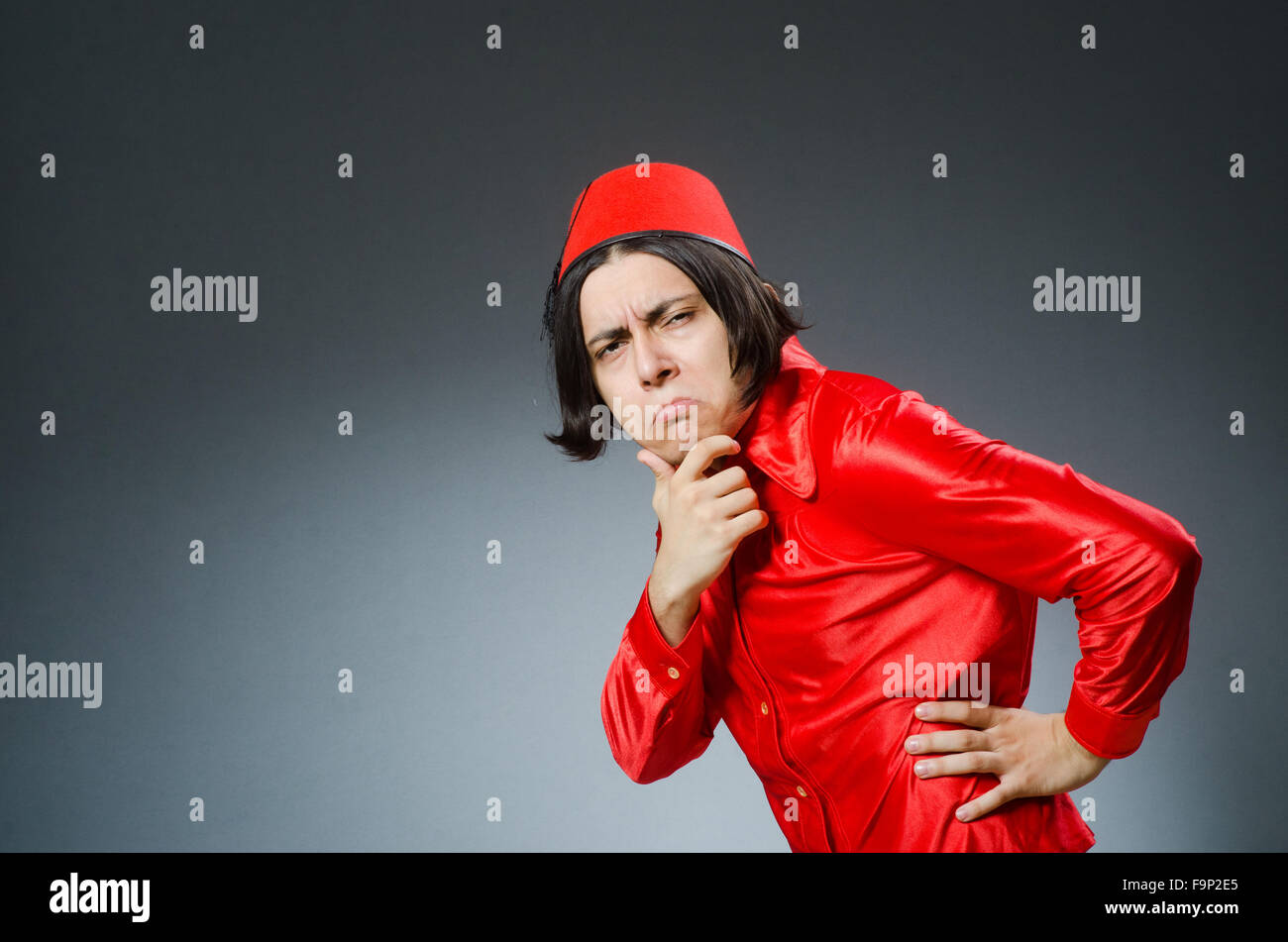 Man wearing red fez hat Stock Photo - Alamy
