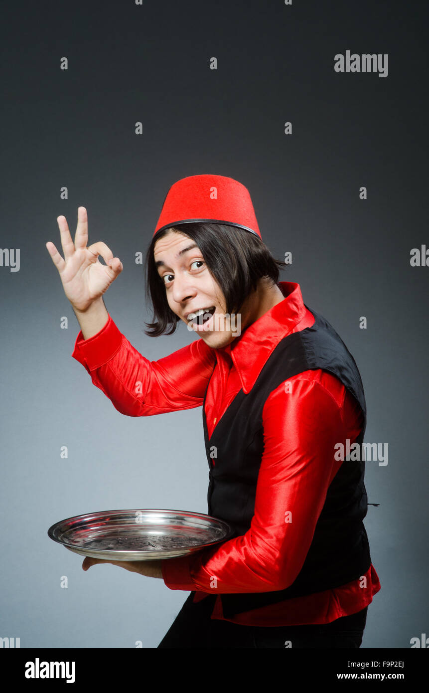 Man wearing red fez hat Stock Photo - Alamy