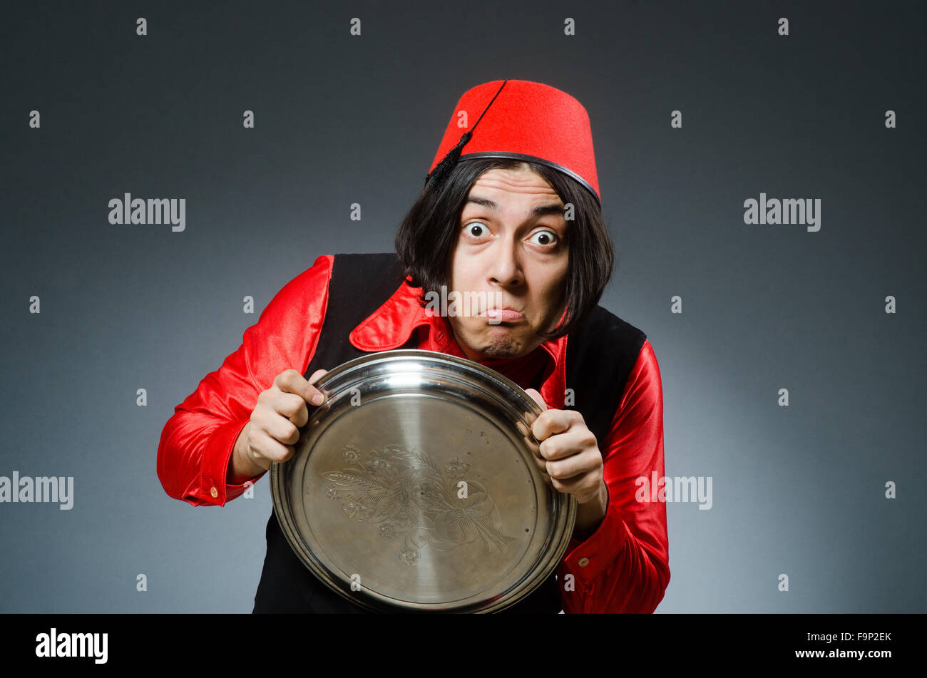 Man wearing red fez hat Stock Photo - Alamy