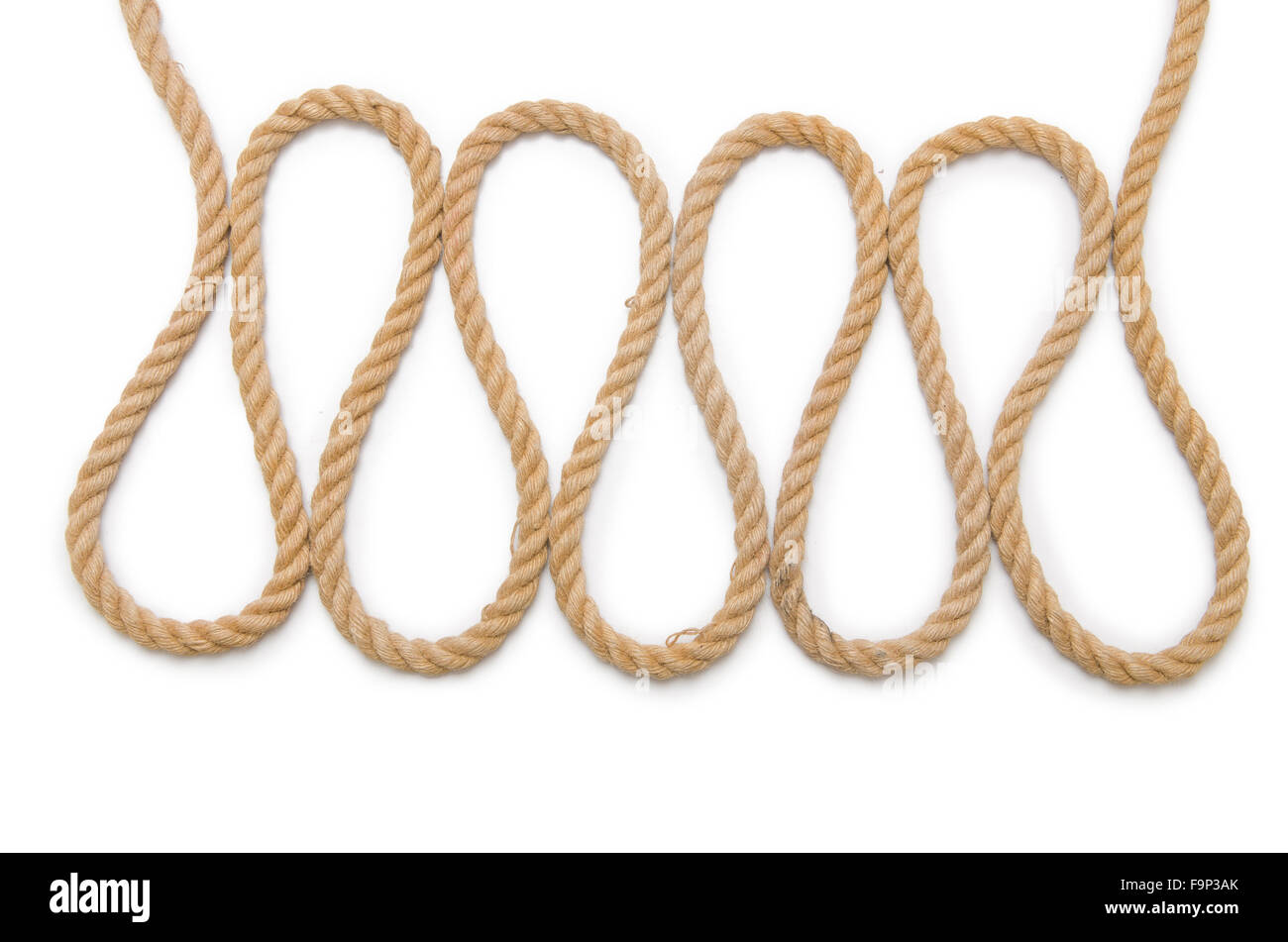 Concept with long hemp rope Stock Photo - Alamy