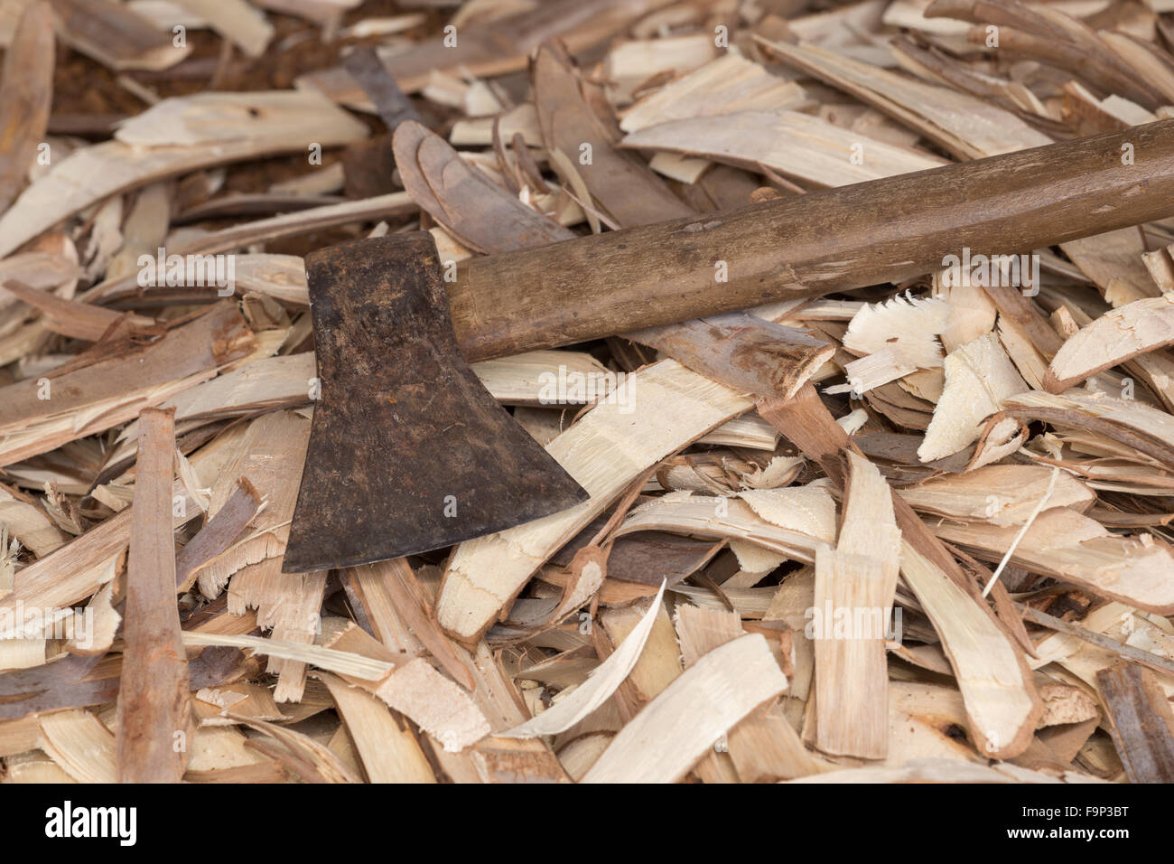 Old heavy axe tool with wood scrap Stock Photo - Alamy