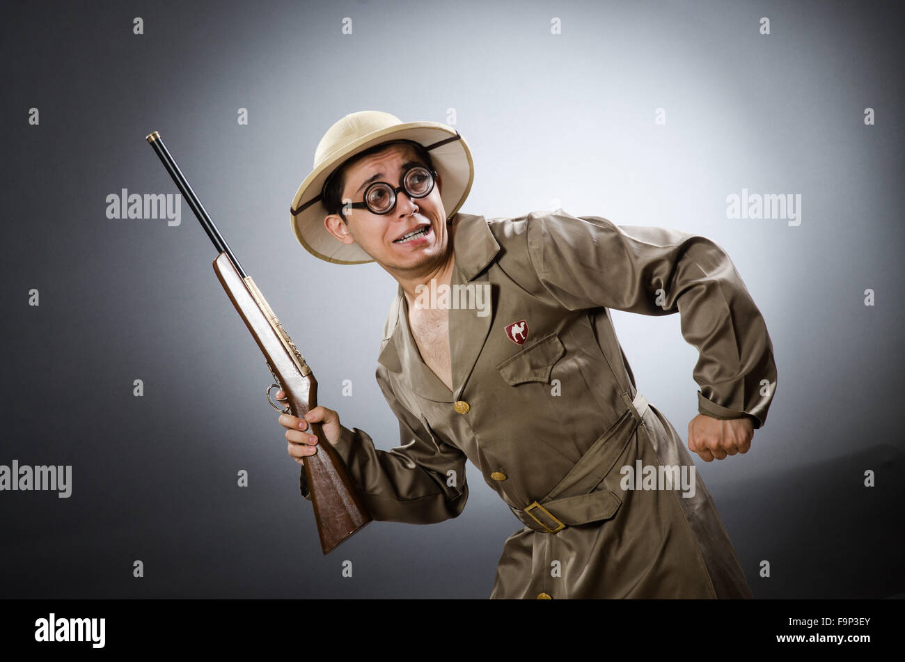 Funny hunter in hunting concept Stock Photo - Alamy
