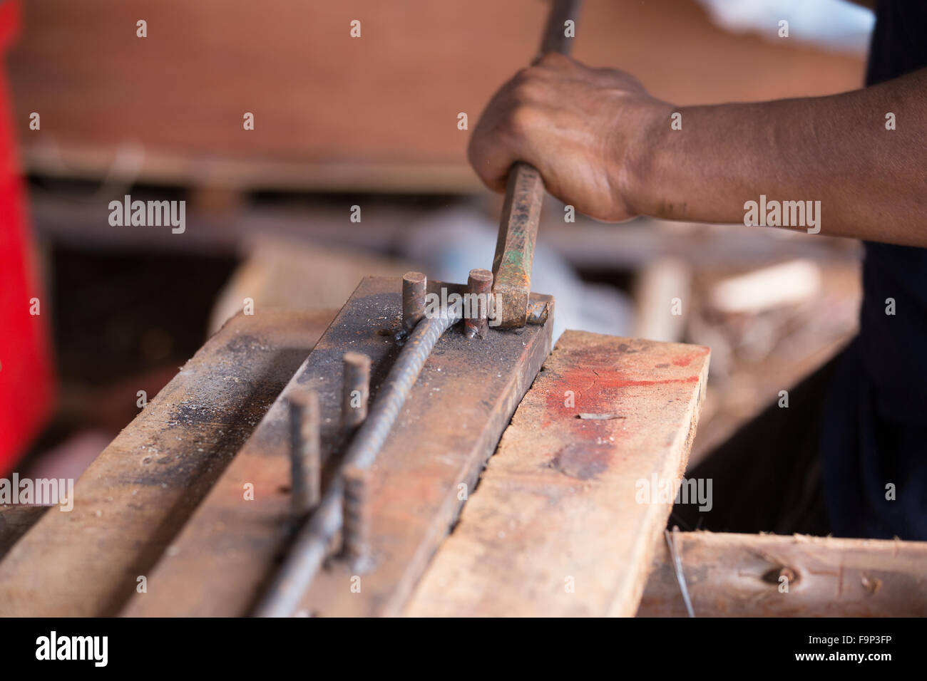 worker bending steel for construction job at construction site Stock ...
