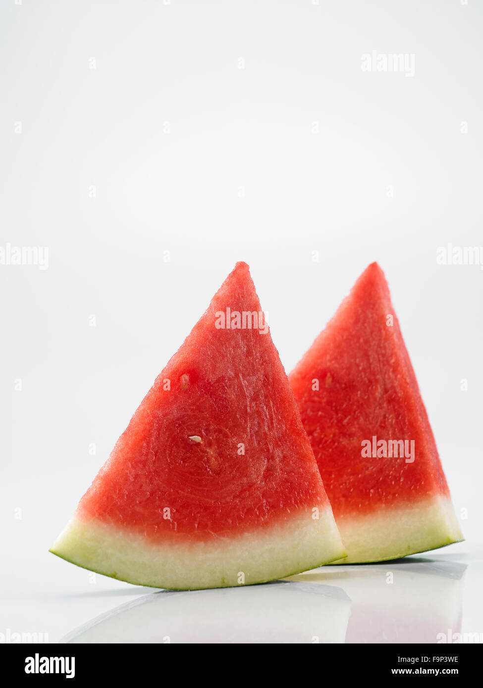 watermelon cut in to a triangle shape Stock Photo - Alamy