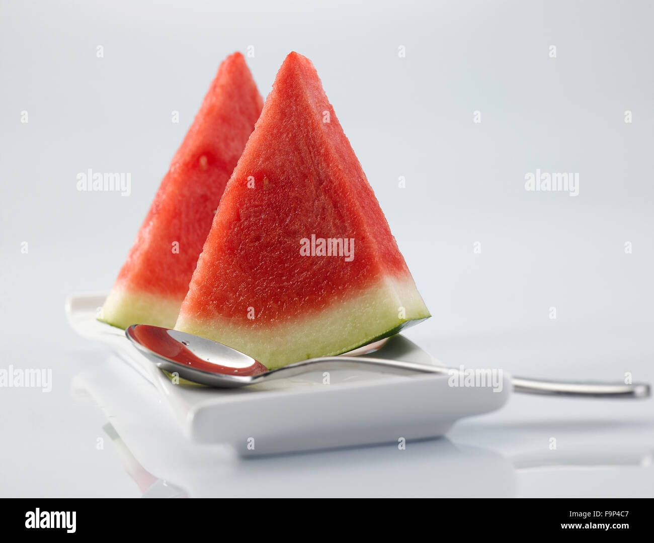 watermelon cut in to a triangle shape Stock Photo - Alamy