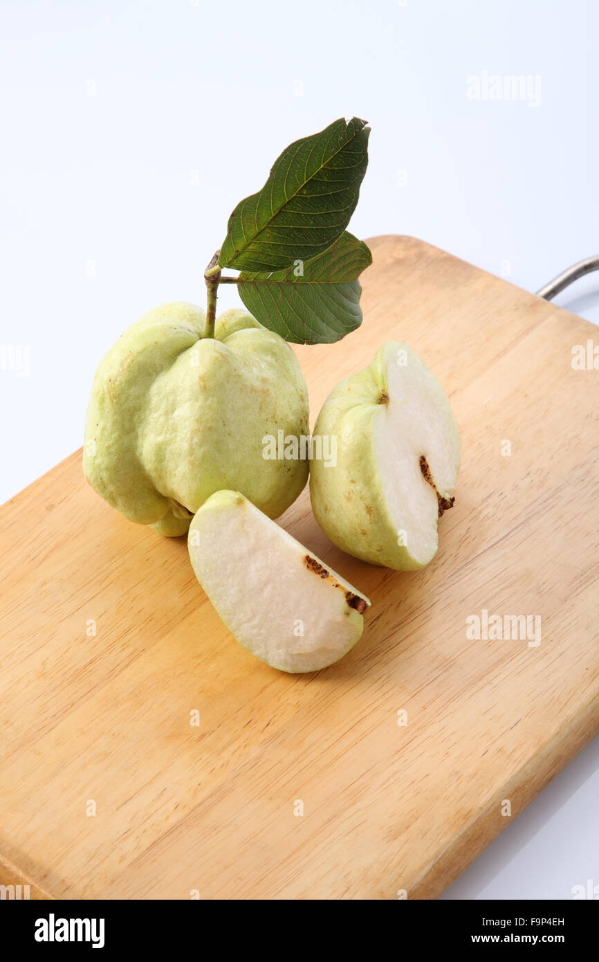 green quava with leaf on the cutting board Stock Photo - Alamy