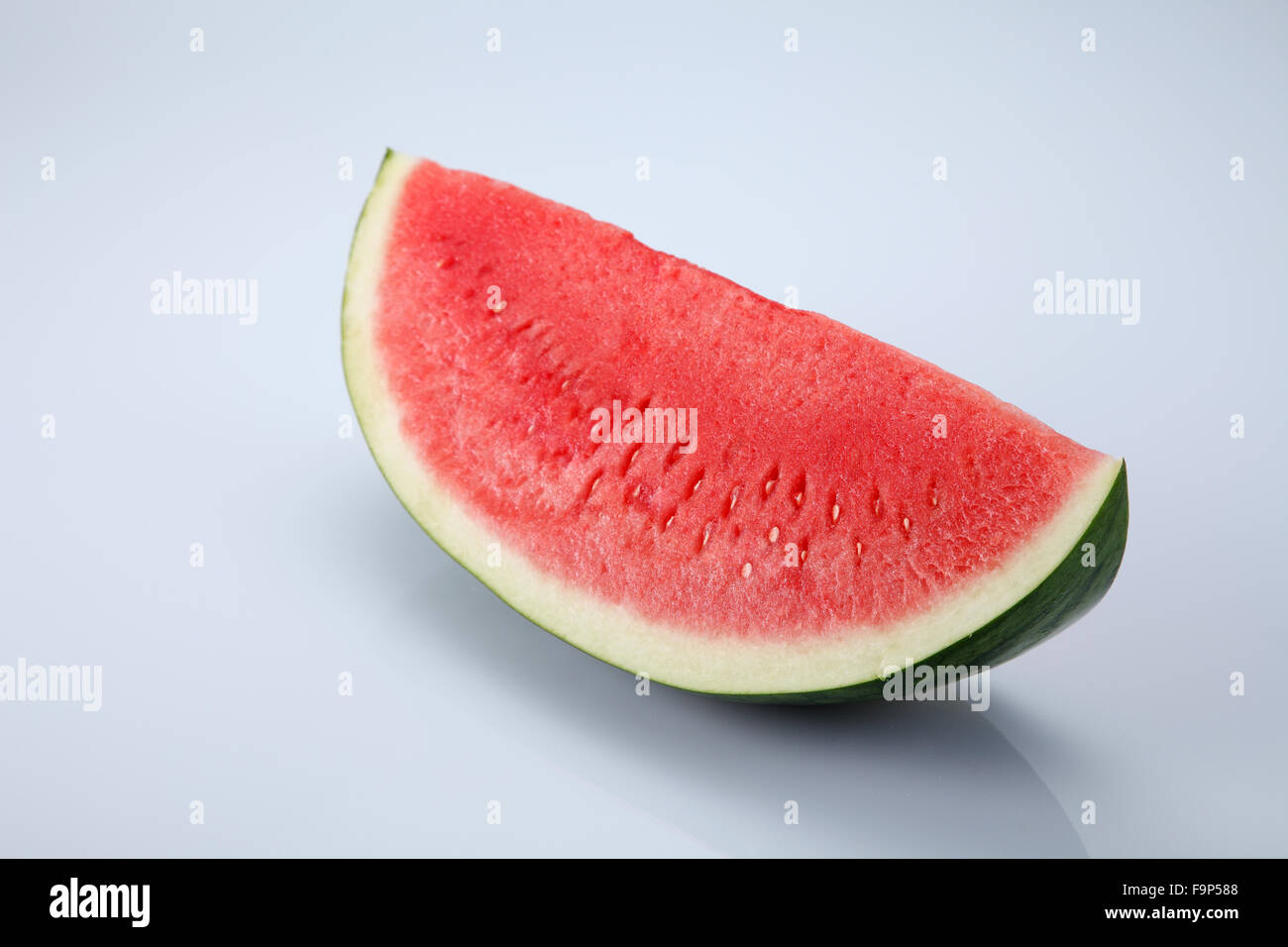 slice of the red watermelon on the white background Stock Photo - Alamy
