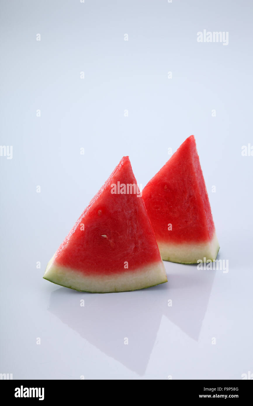 watermelon cut in to a triangle shape Stock Photo - Alamy