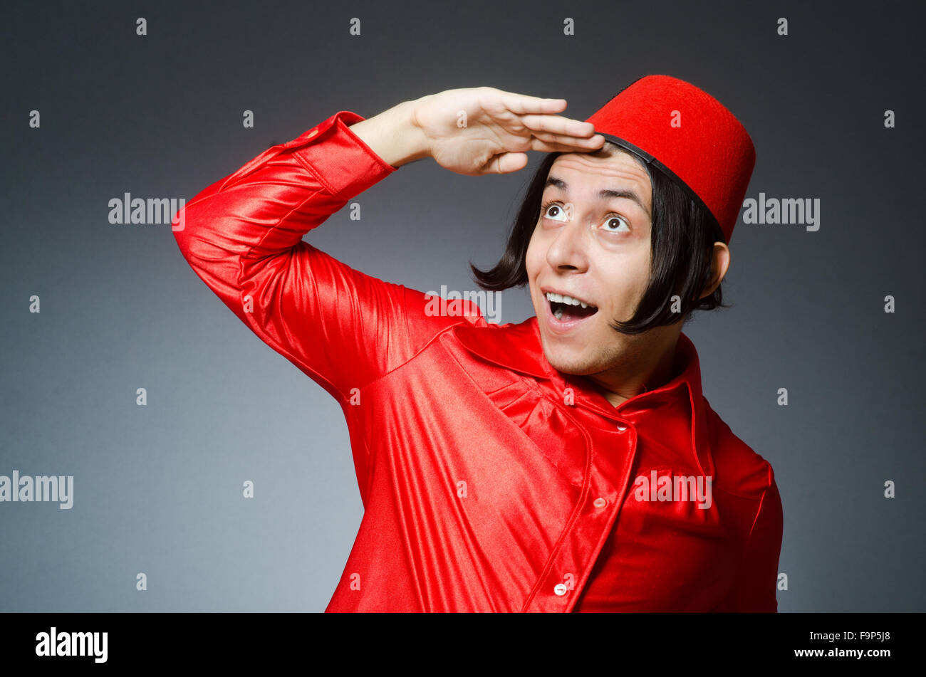 Man wearing red fez hat Stock Photo - Alamy