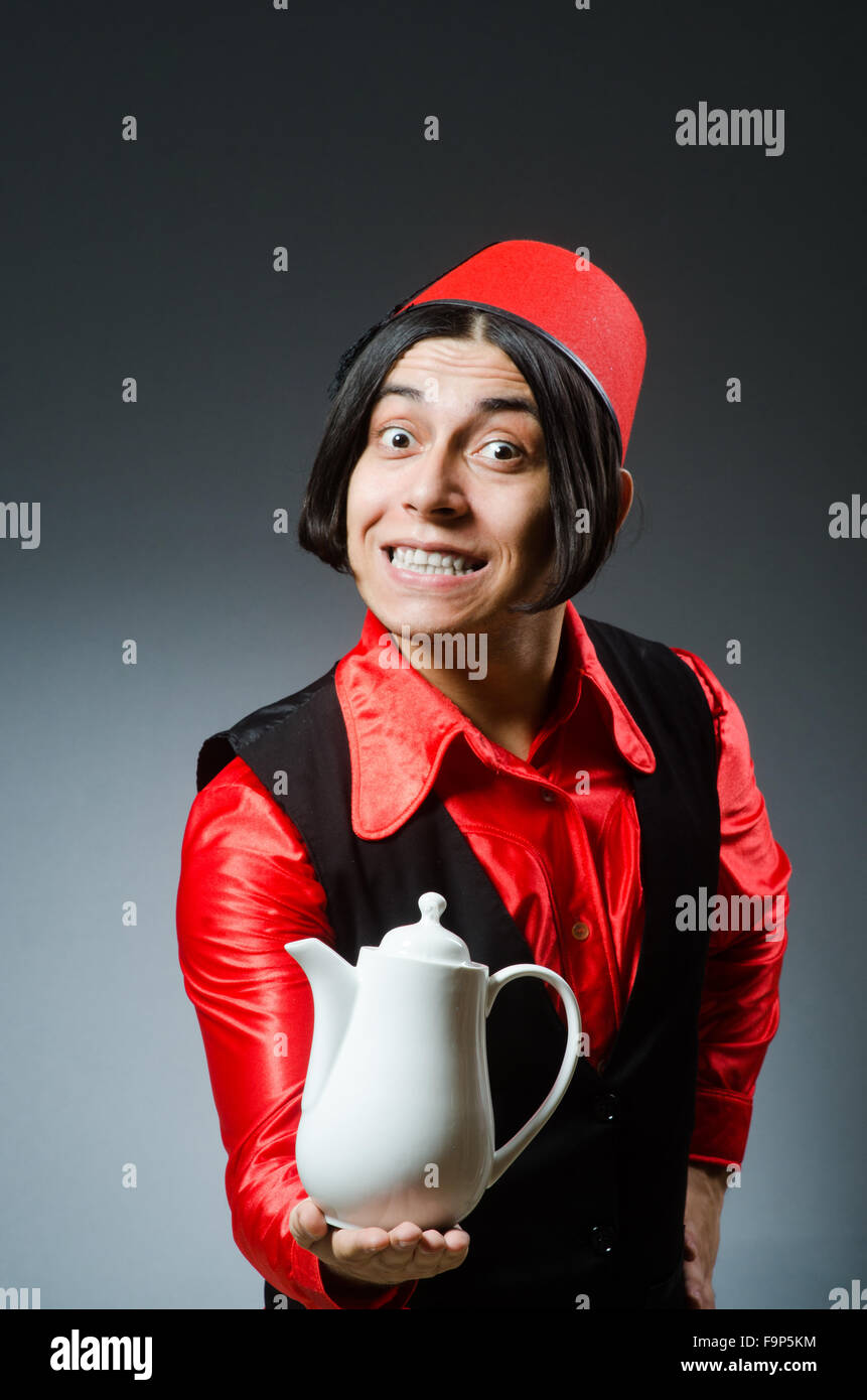 Man wearing red fez hat Stock Photo - Alamy