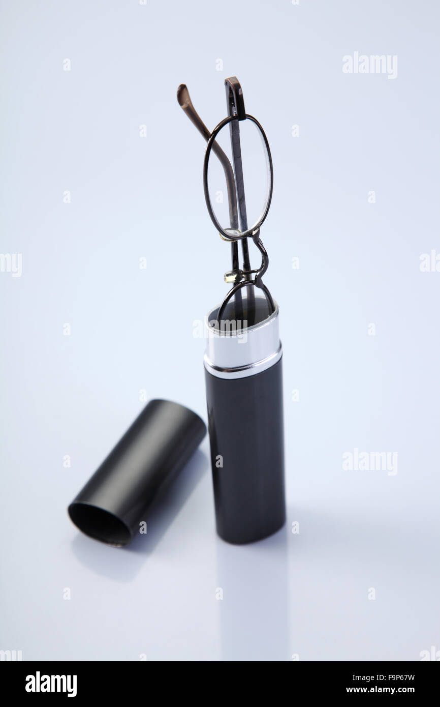 reading glass with gray container Stock Photo - Alamy