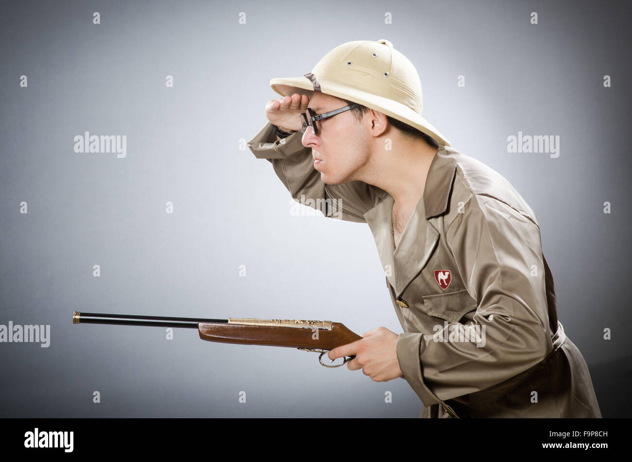 Funny hunter in hunting concept Stock Photo - Alamy