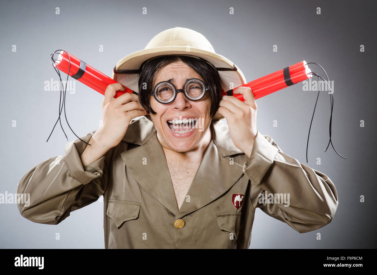 Funny safari traveller in travelling concept Stock Photo - Alamy
