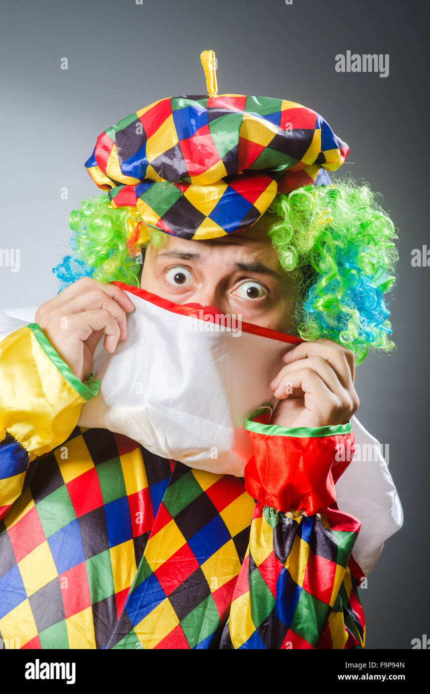 Funny clown in comical concept Stock Photo - Alamy