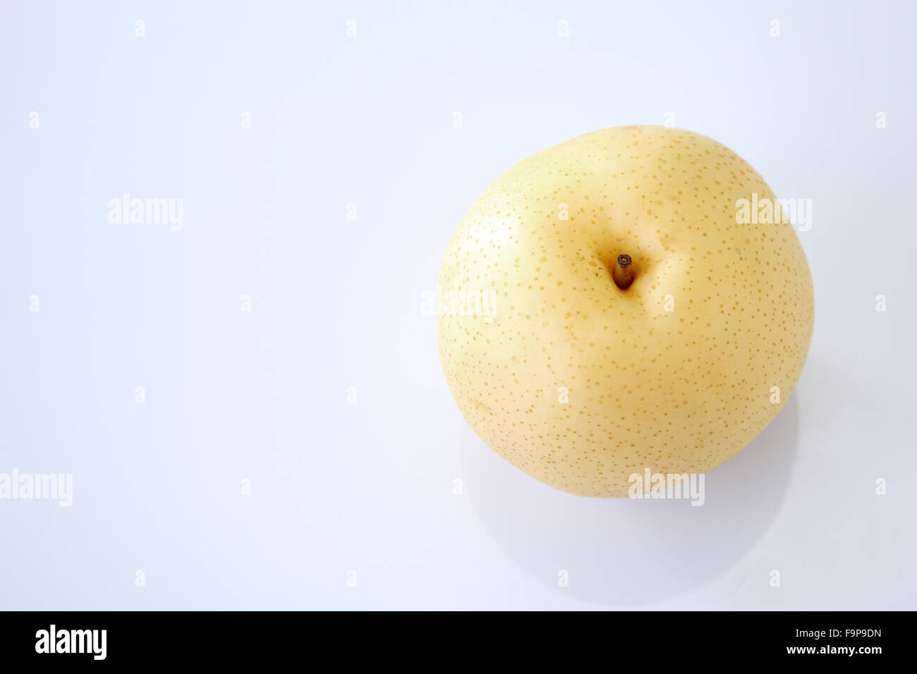 Yellow pear isolated on white background Stock Photo - Alamy