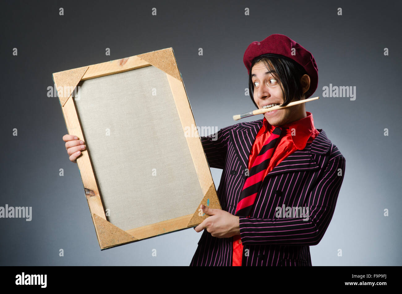 Funny artist with his artwork Stock Photo - Alamy