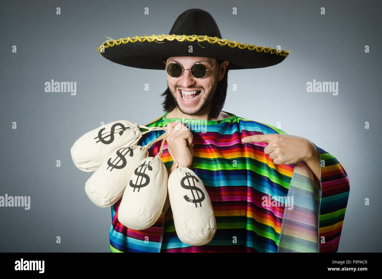 Mexican man with money sacks Stock Photo - Alamy