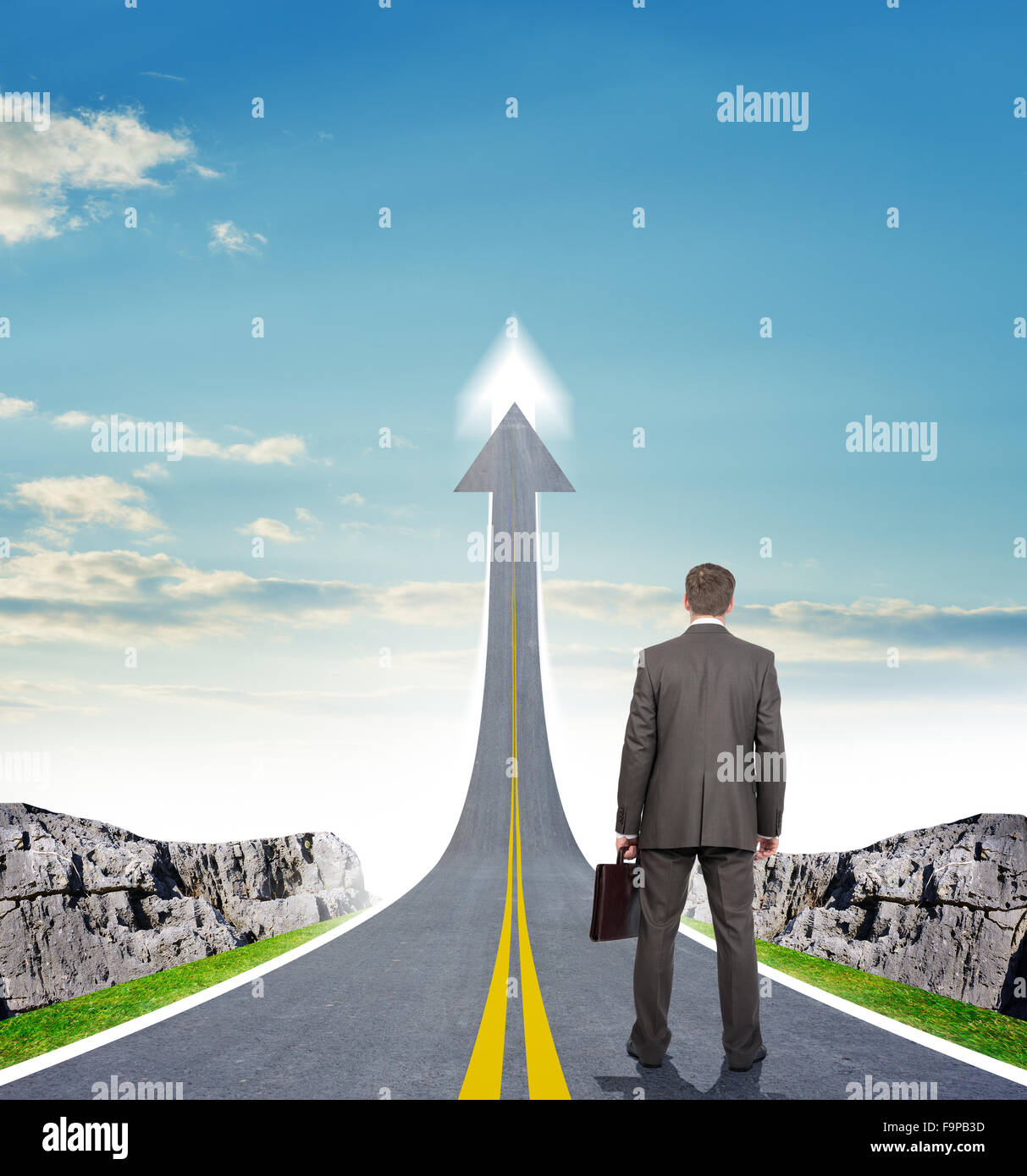 Man standing on highway going up as arrow Stock Photo - Alamy