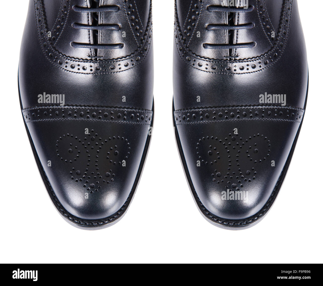 Tip of male shoes isolated on white Stock Photo - Alamy