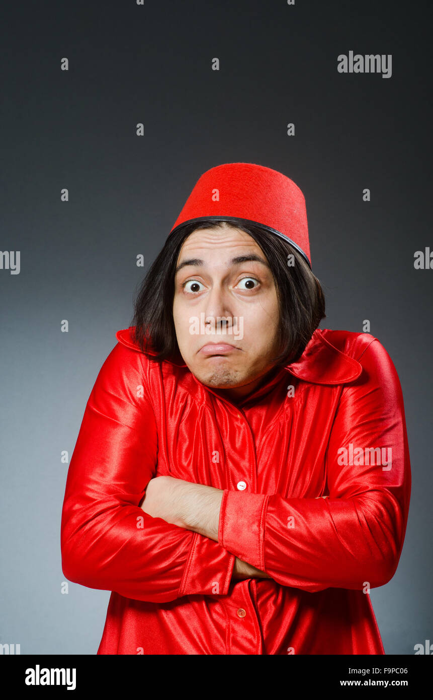 Man wearing red fez hat Stock Photo - Alamy