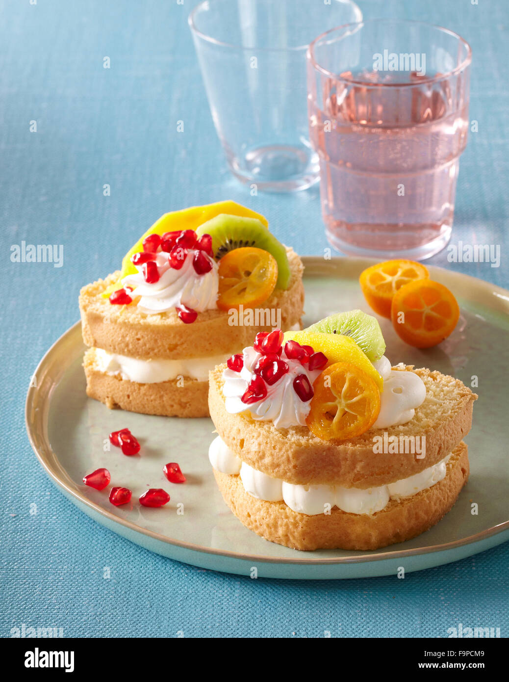 Fruit and coconut sponge sandwiches Stock Photo - Alamy